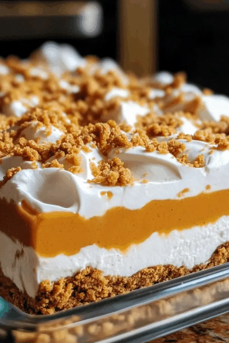 Creamy Layered Pumpkin Dessert with a Ginger Snap Crust - recipe maestro